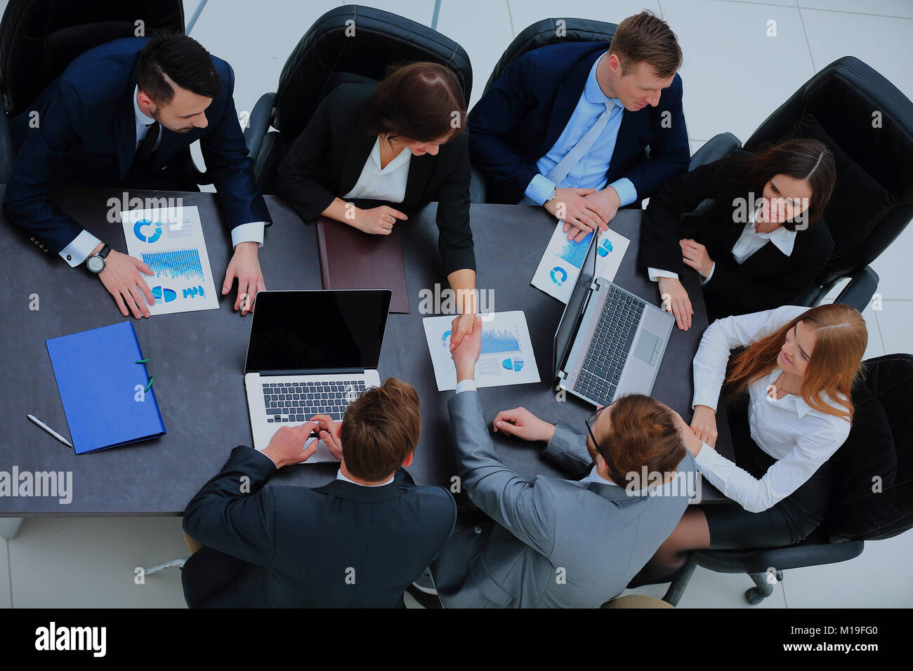Top view meeting table hand shake hi-res stock photography and images ...