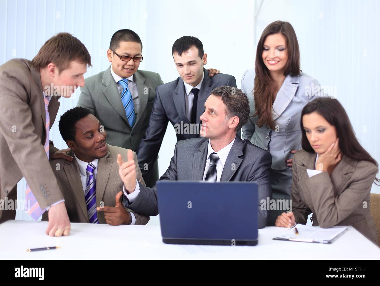 Manager and business team in office Stock Photo - Alamy