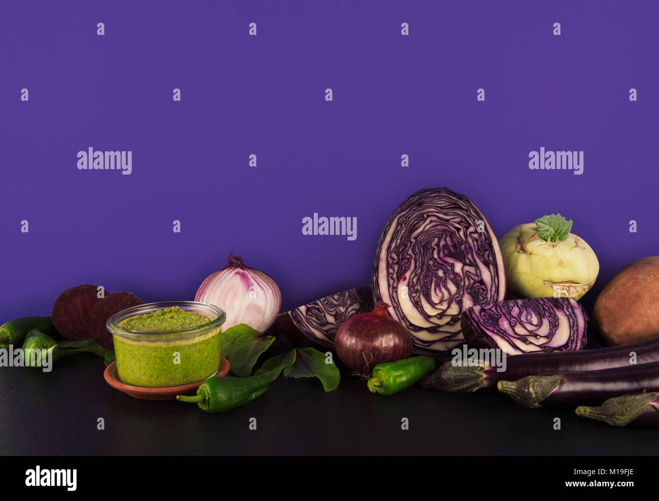 Assortment of raw organic violet vegetables Stock Photo - Alamy