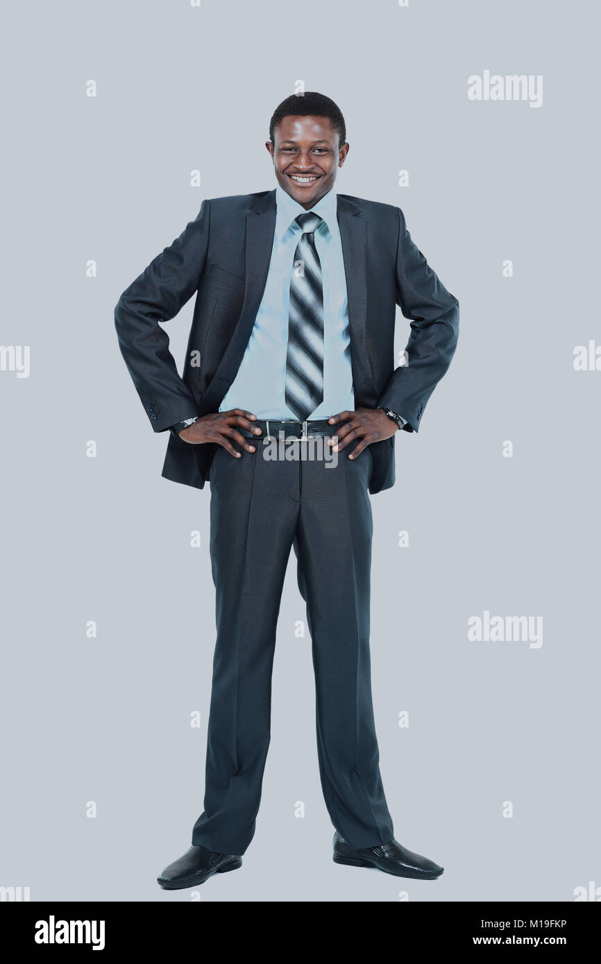 Portrait of smiling African American business man standing over white ...
