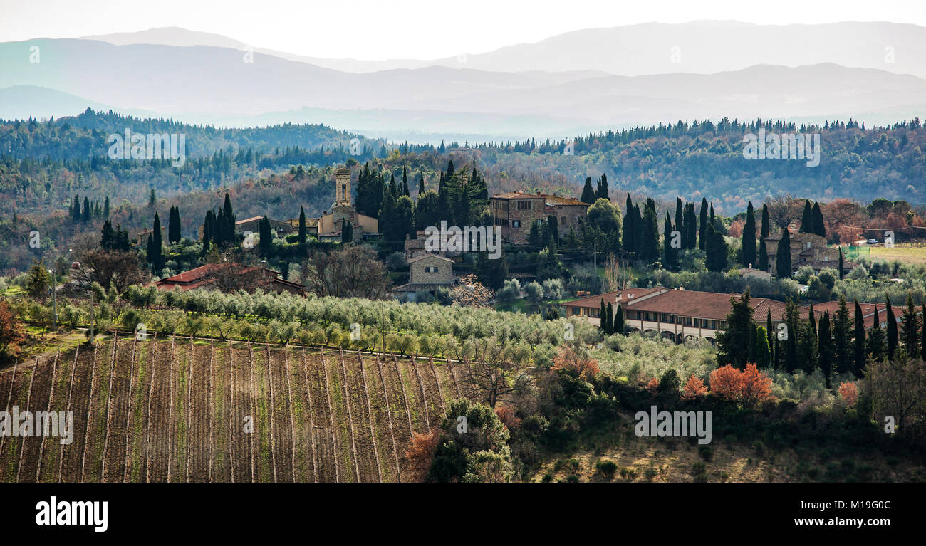 Tuscan landscape and country road with cypress, trees and ancient ...