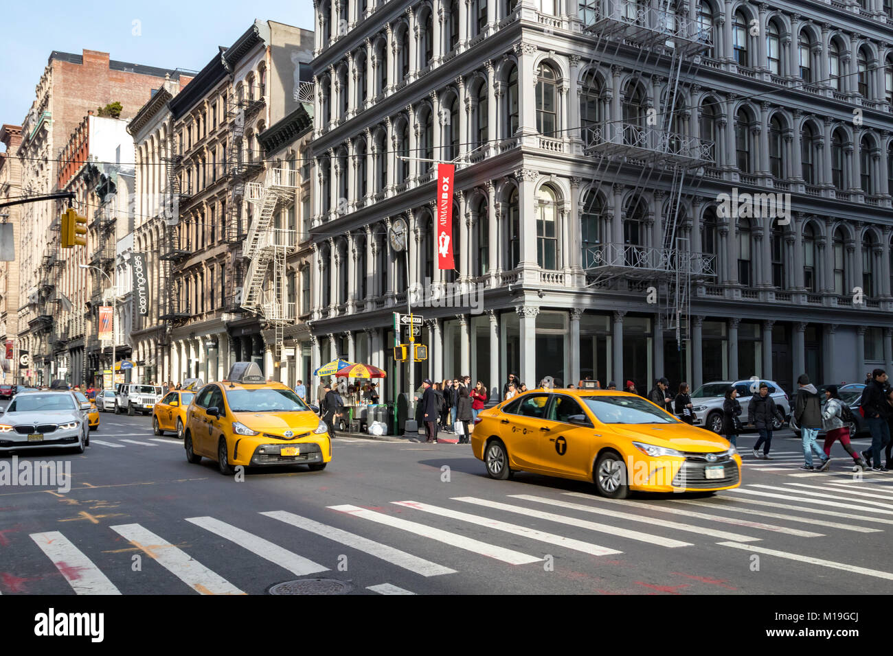 NEW YORK CITY - CIRCA 2017: Taxis drive down through a busy ...