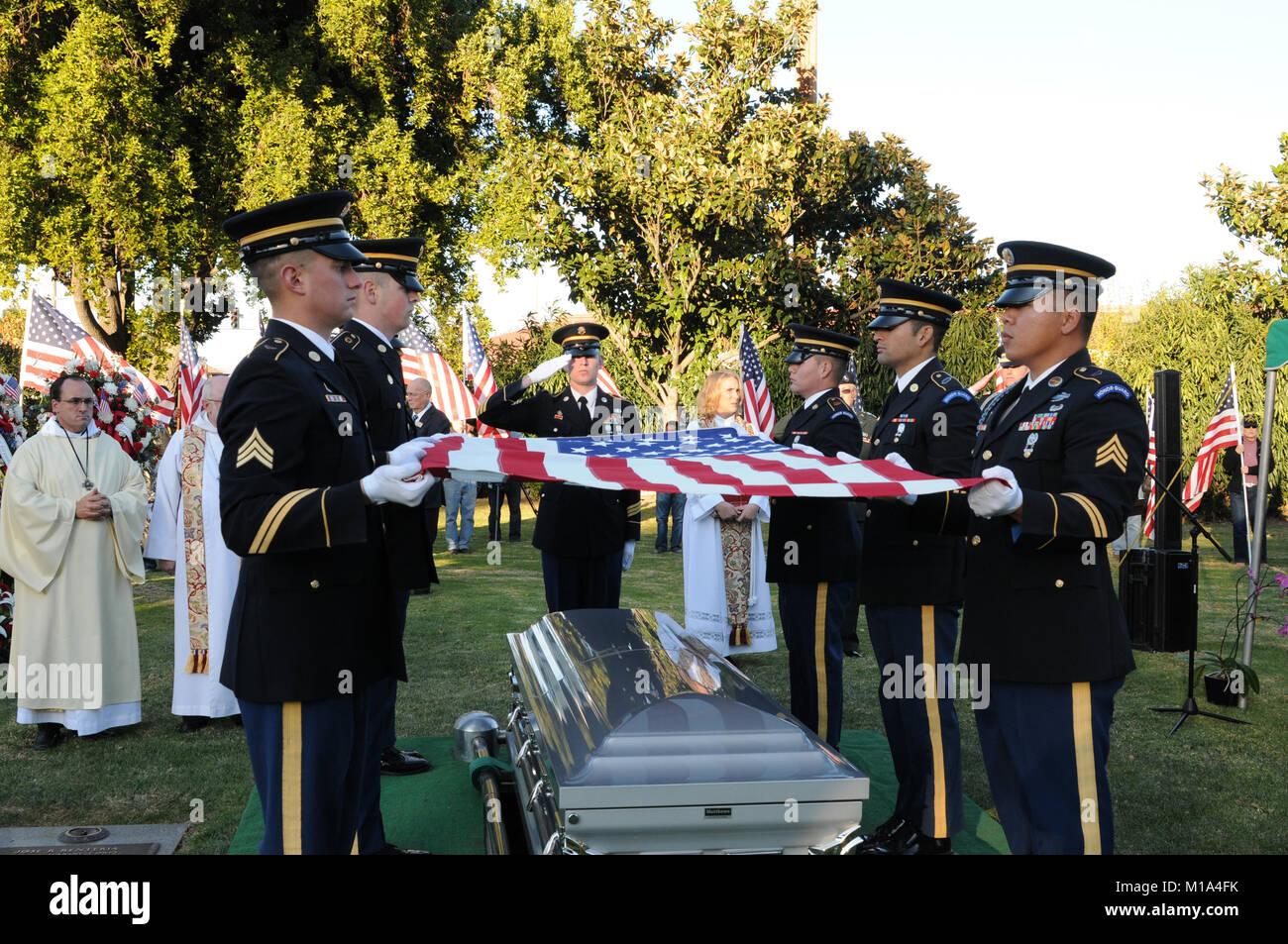 111203-Z-WM549-007 The California Army National Guard Honor Guard lifts ...