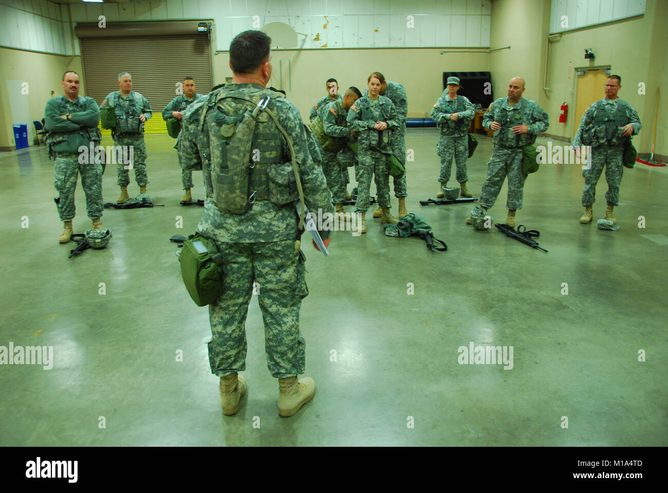 Sgt. 1st Class Brian Breaker briefs his team and goes over pre-mission ...