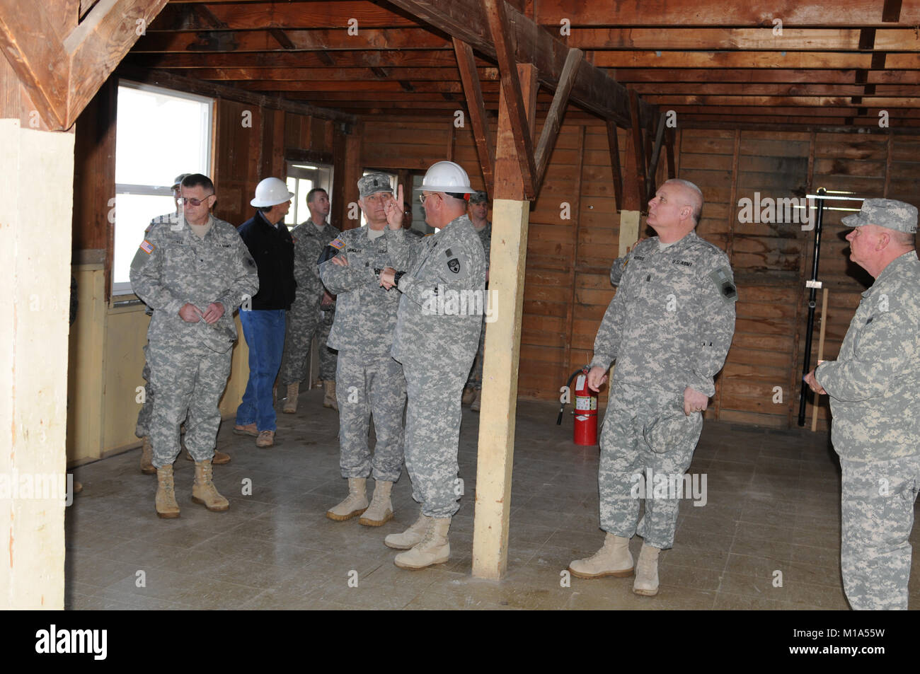 Command Sgt. Maj. Joseph Menard, center white hat, speaks with Sgt. Maj ...