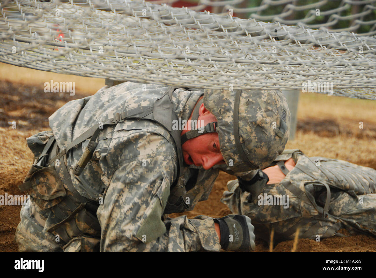 Spc. Benjamin Mason, Arizona Army National Guard, drags a casualty ...