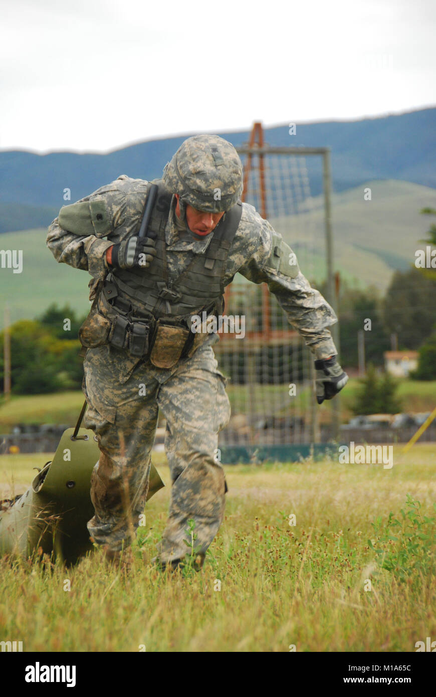 Spc. Benjamin Mason, Arizona Army National Guard, finishes the final ...