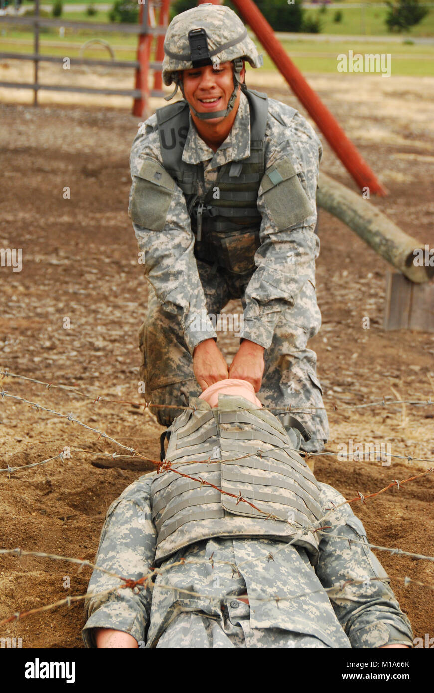 Staff Sgt. Demetrius McCowan, California Army National Guard, drags a ...
