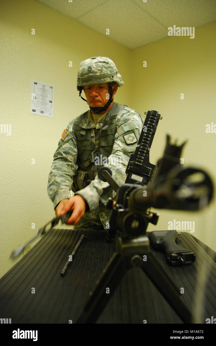 Sgt. 1st Class Maurice Gomez, New Mexico National Guard, shows his ...