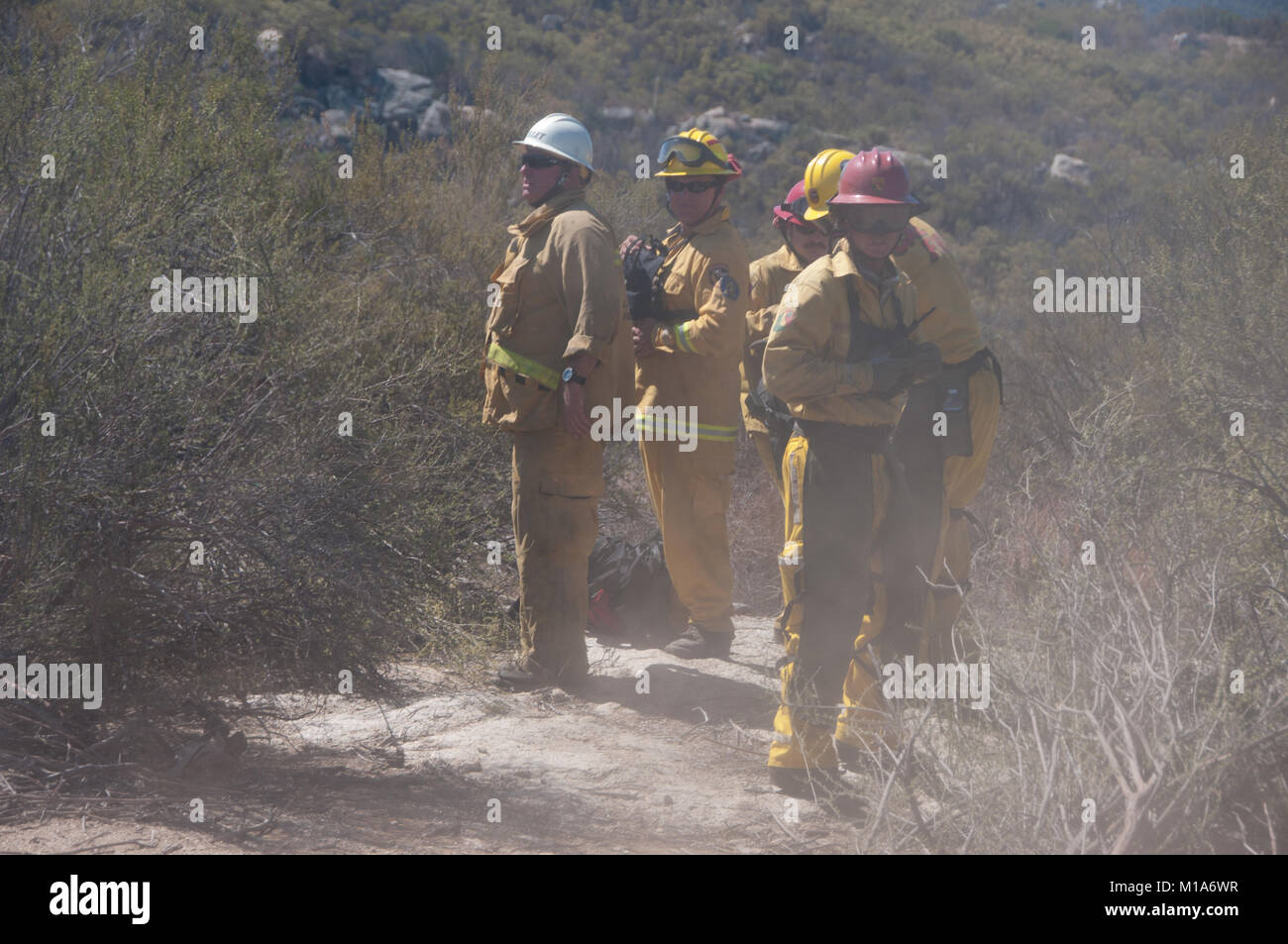 CAL FIRE hand crew fire managers are transported to the fire line by ...