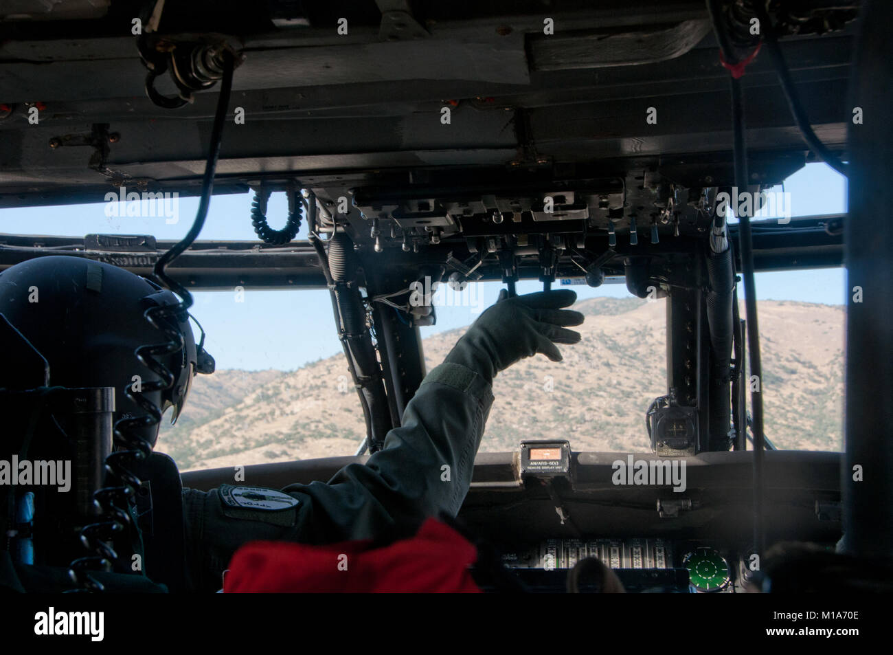 Joint Fire Fighting: Two HH-60G Pave Hawk helicopters from the 129th ...
