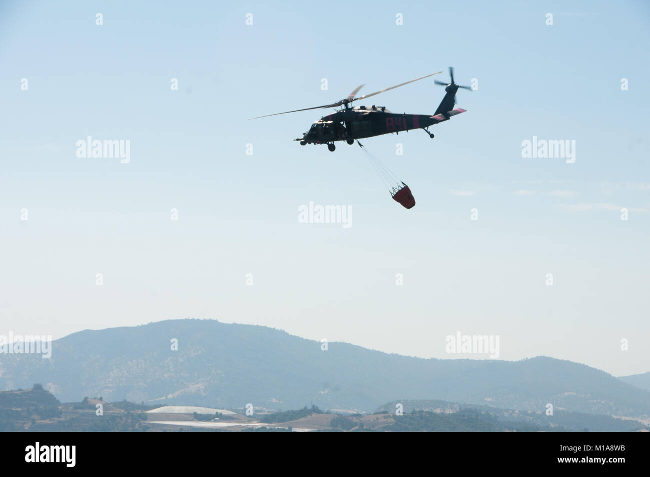 California Army National Guard UH-60 Black Hawk helicopters from the 1 ...
