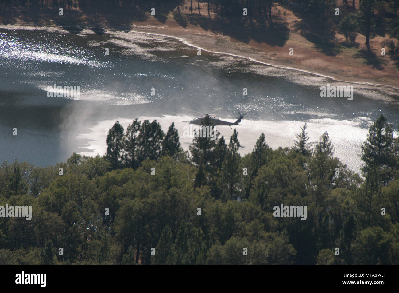 Photos show helibase, 129th Rescue Wing, cloud coverage, fires, and ...