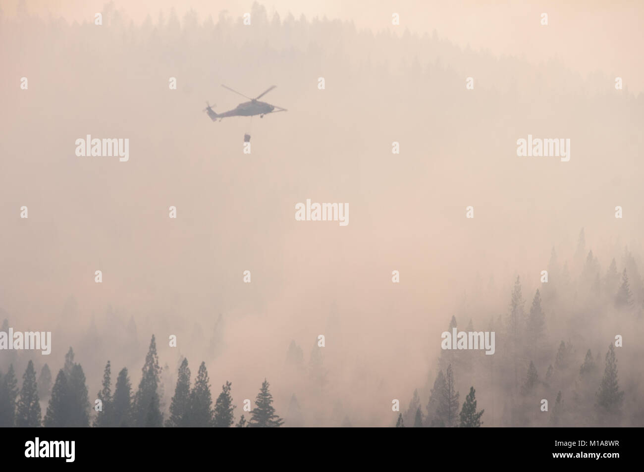 Photos show helibase, 129th Rescue Wing, cloud coverage, fires, and ...