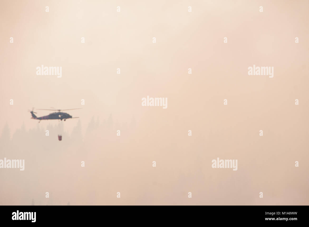 Photos show helibase, 129th Rescue Wing, cloud coverage, fires, and ...