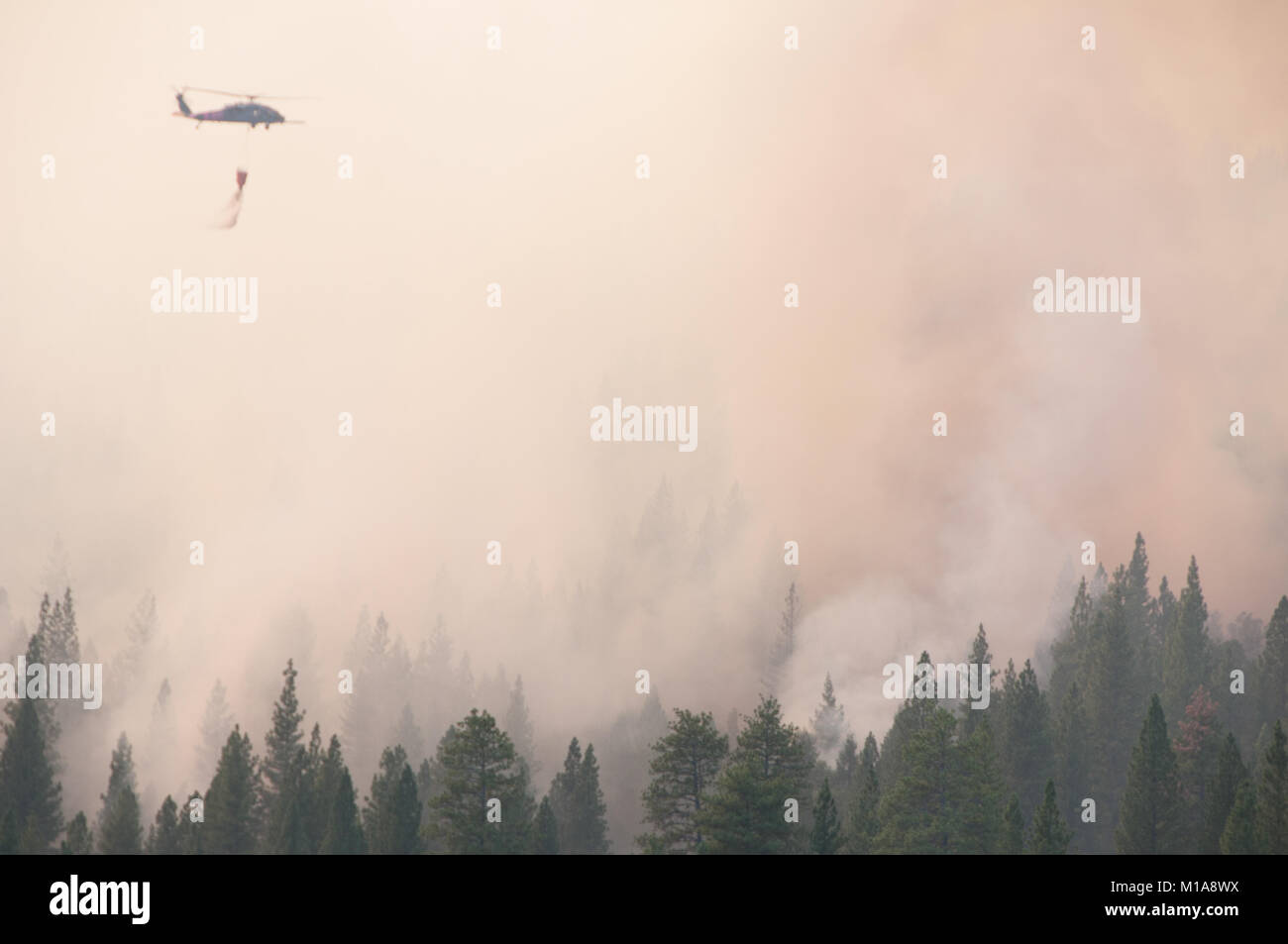 Photos show helibase, 129th Rescue Wing, cloud coverage, fires, and ...