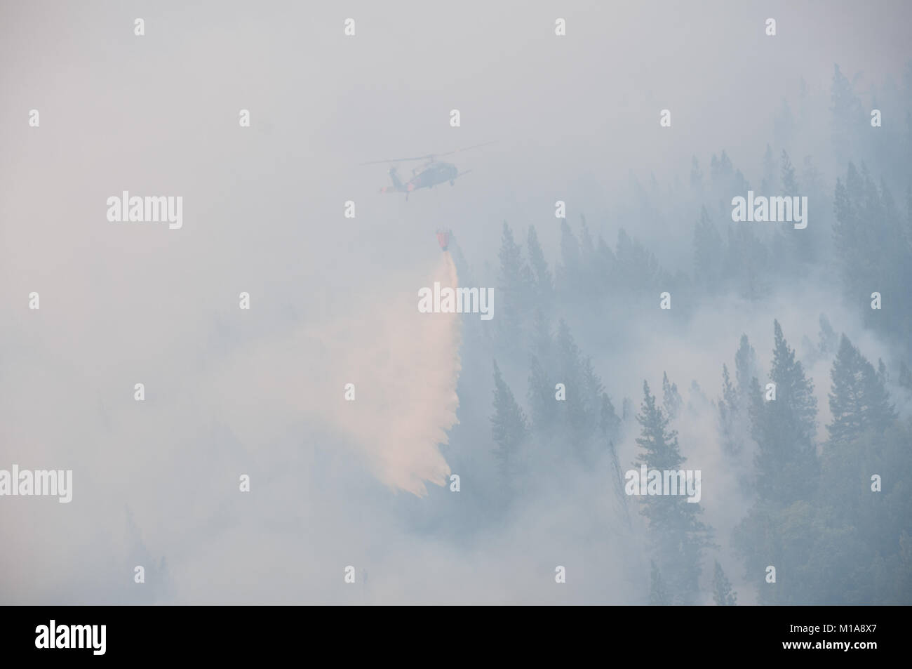 Photos show helibase, 129th Rescue Wing, cloud coverage, fires, and ...