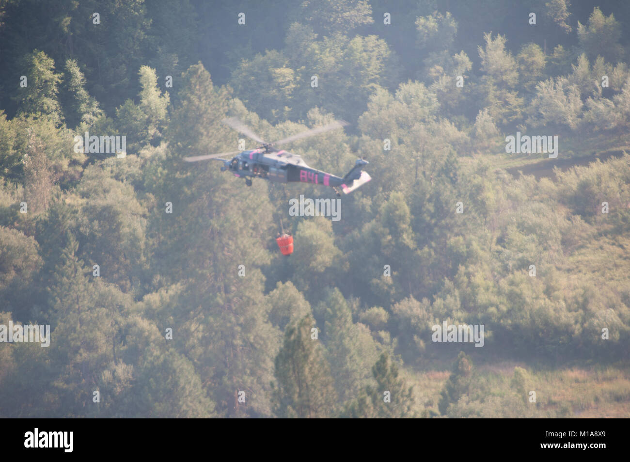 Photos show helibase, 129th Rescue Wing, cloud coverage, fires, and ...