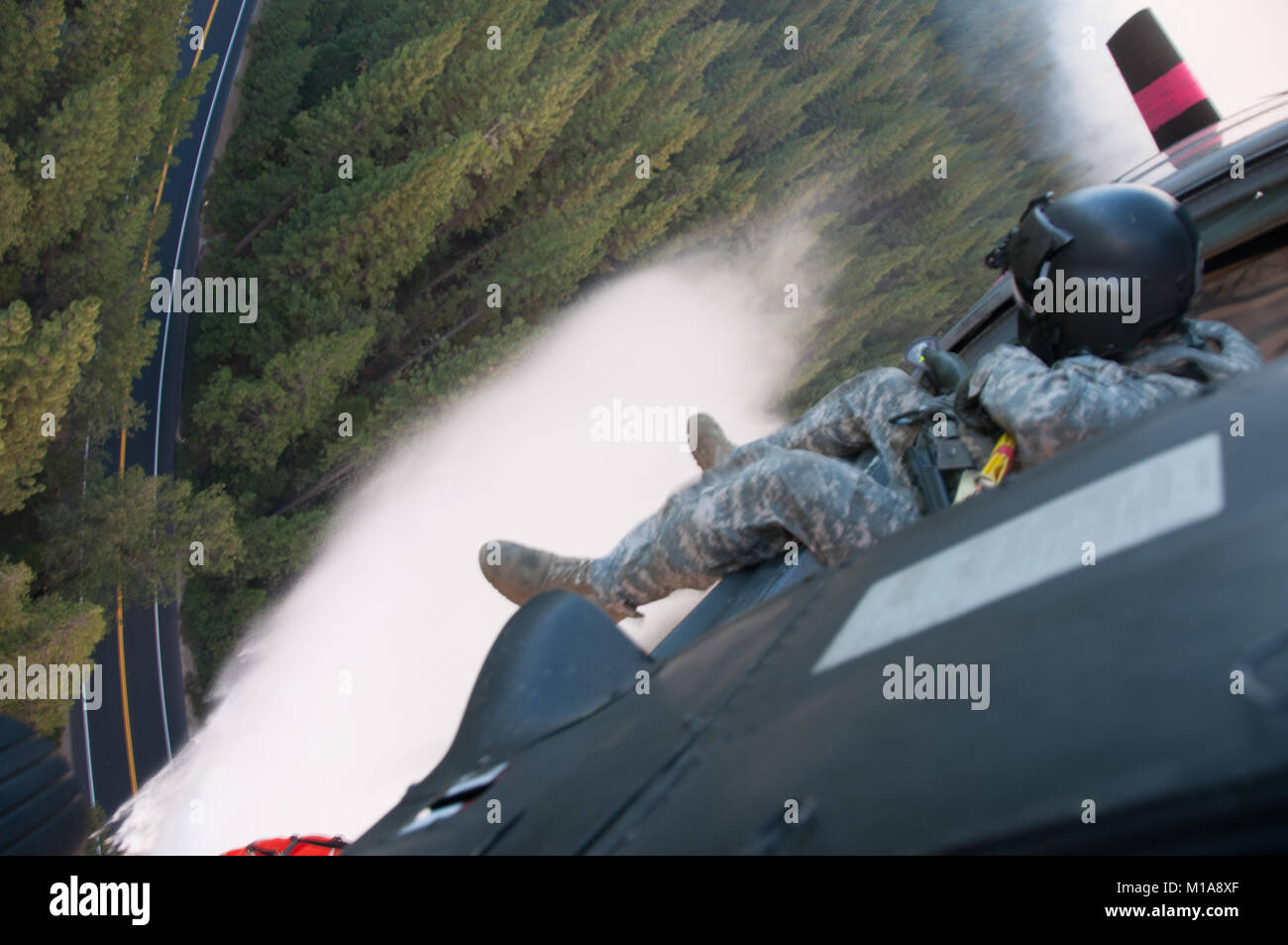 Photos show helibase, 129th Rescue Wing, cloud coverage, fires, and ...