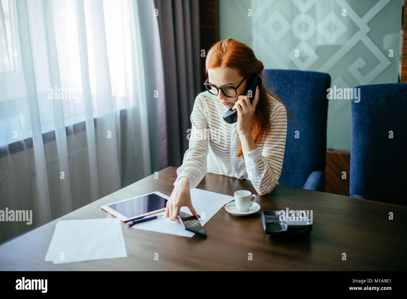 businesswoman working in office Stock Photo - Alamy