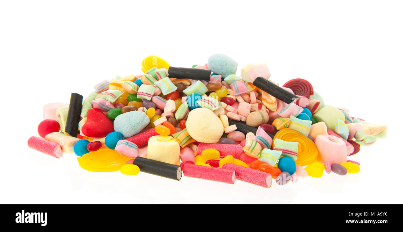 Mixed colorful candy isolated over white background Stock Photo - Alamy