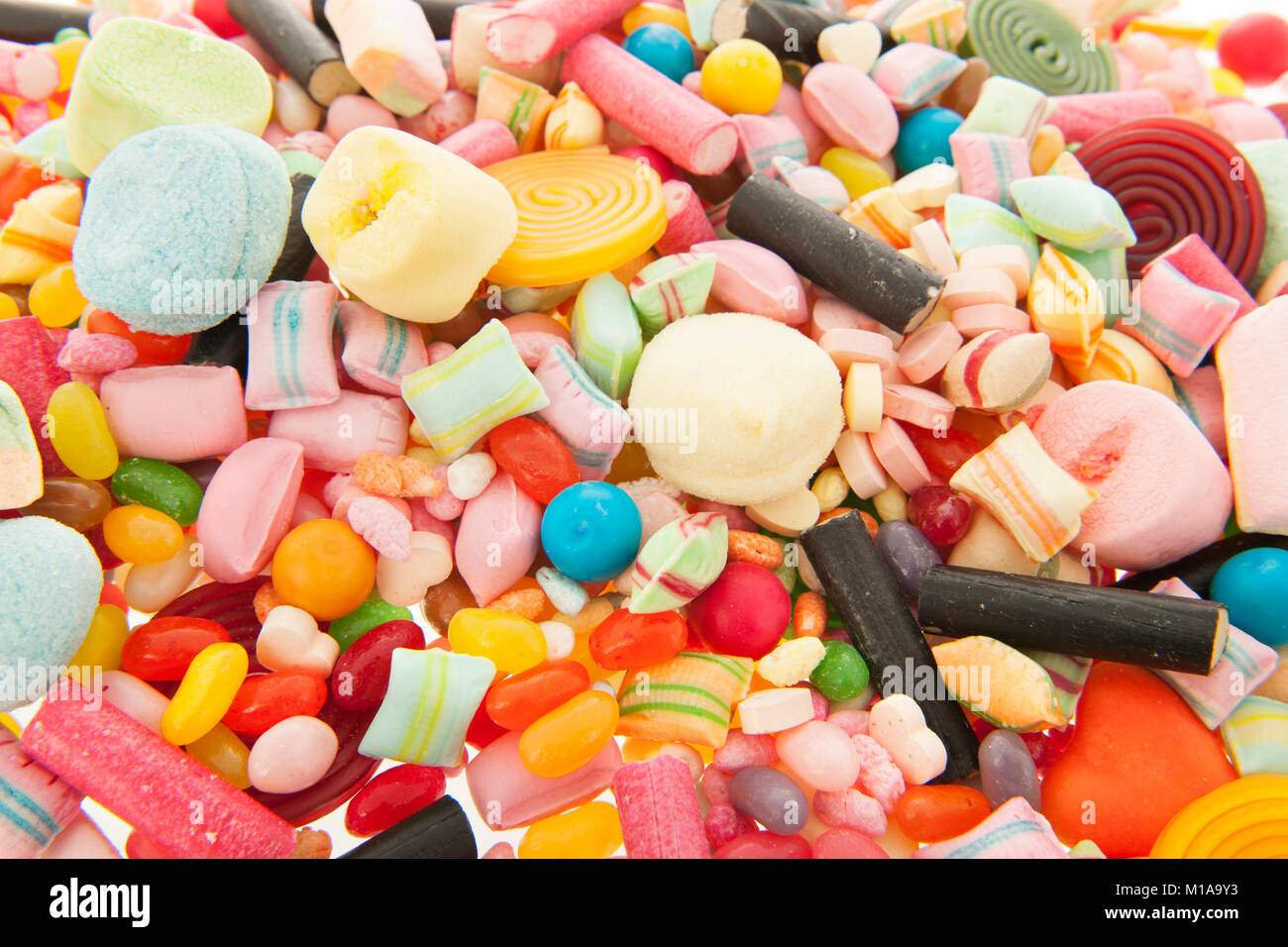 Mixed colorful sweet candy as background Stock Photo - Alamy