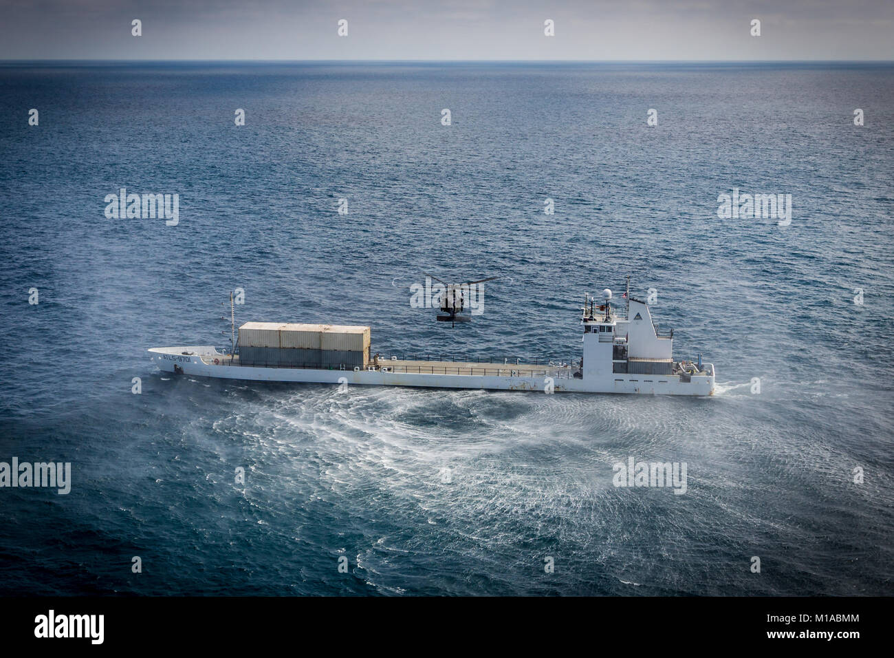 Jolly 91 approaches the training ship for a 30-foot fast rope insertion ...