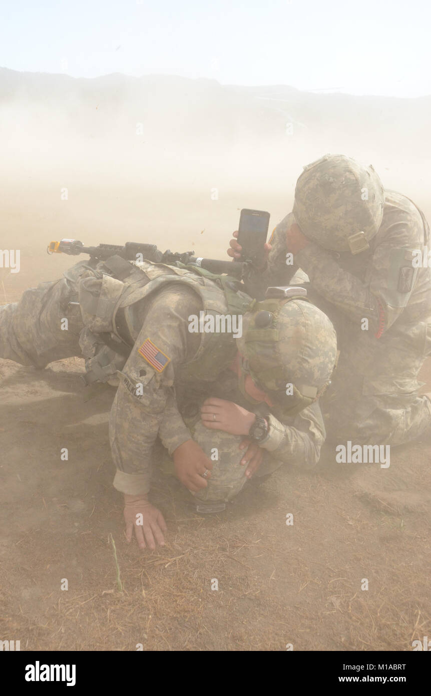 Spc. Taylor Walker, left, a field medic with Headquarters, 1st Squadron ...