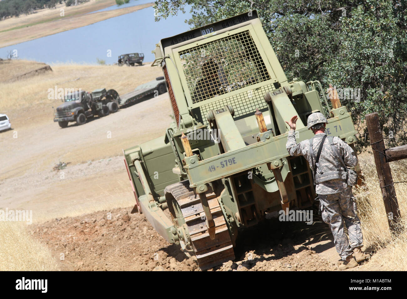 Staff Sgt. Michael Stillwell, right, of the 649th Engineer Company ...