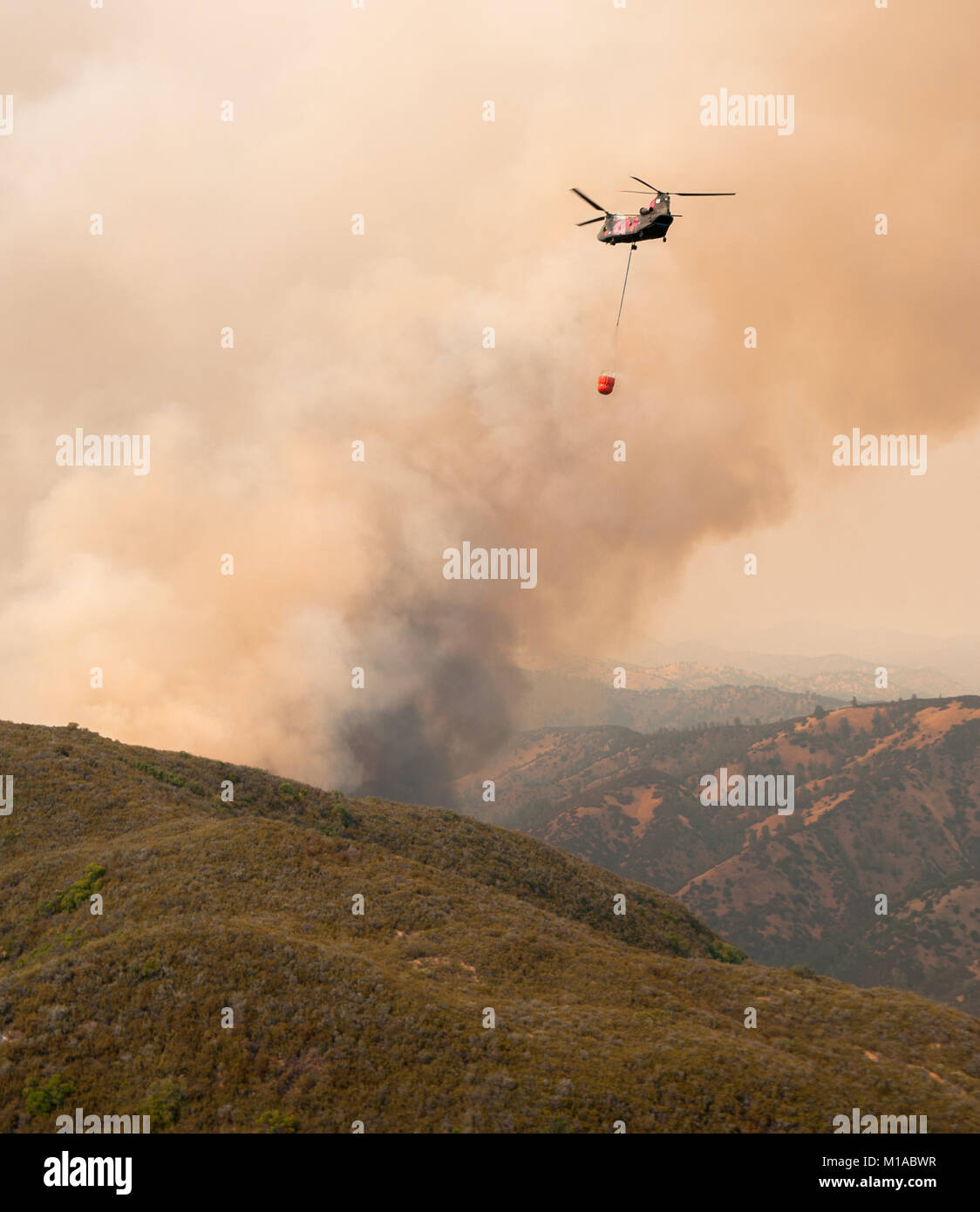 A California Army National Guard CH-47 Chinook helicopter prepares to ...