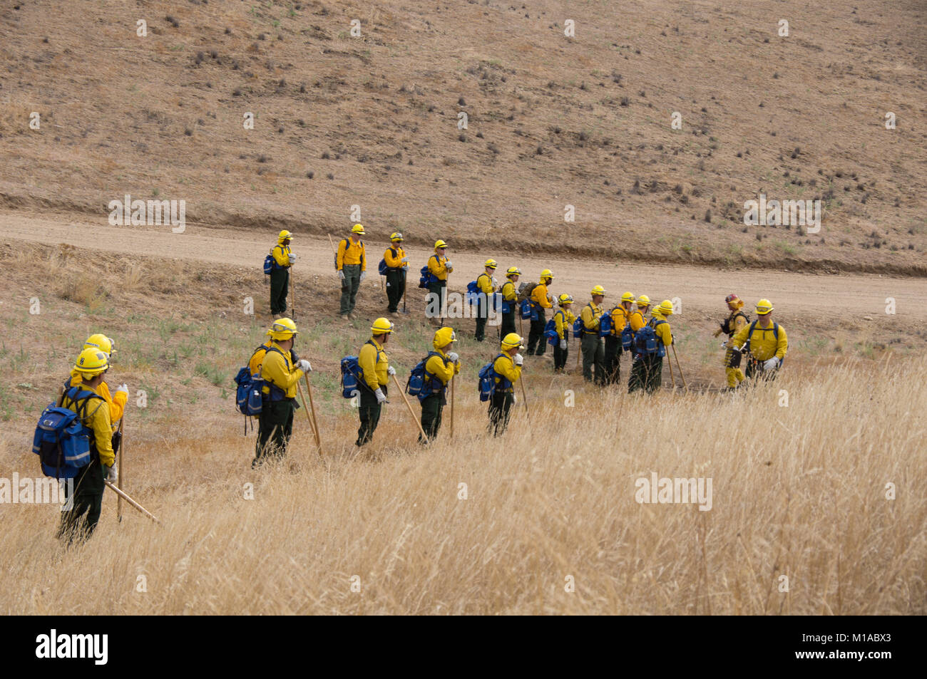 California Army National Guard Hand Crew is watching a demonstration by ...