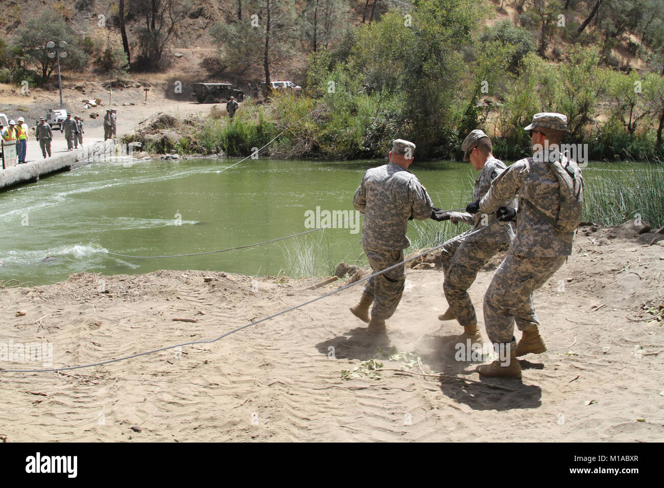 Members of the 132nd Multirole Bridge Company (MRBC), California Army ...