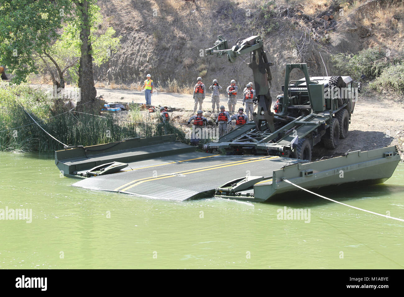 The first of four platforms used to erect a temporary floating bridge ...