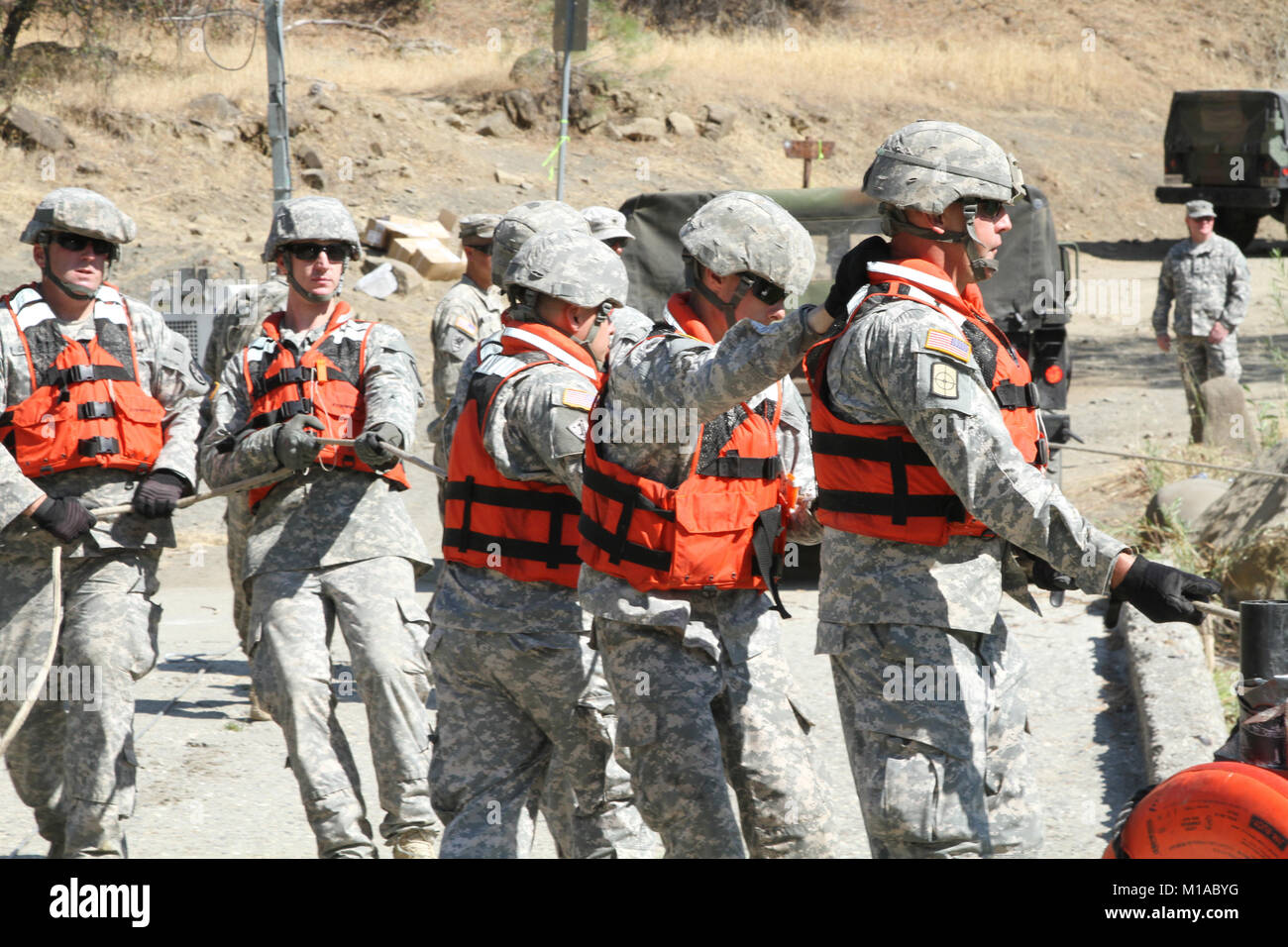 Members of the 132nd Multirole Bridge Company (MRBC), California Army ...