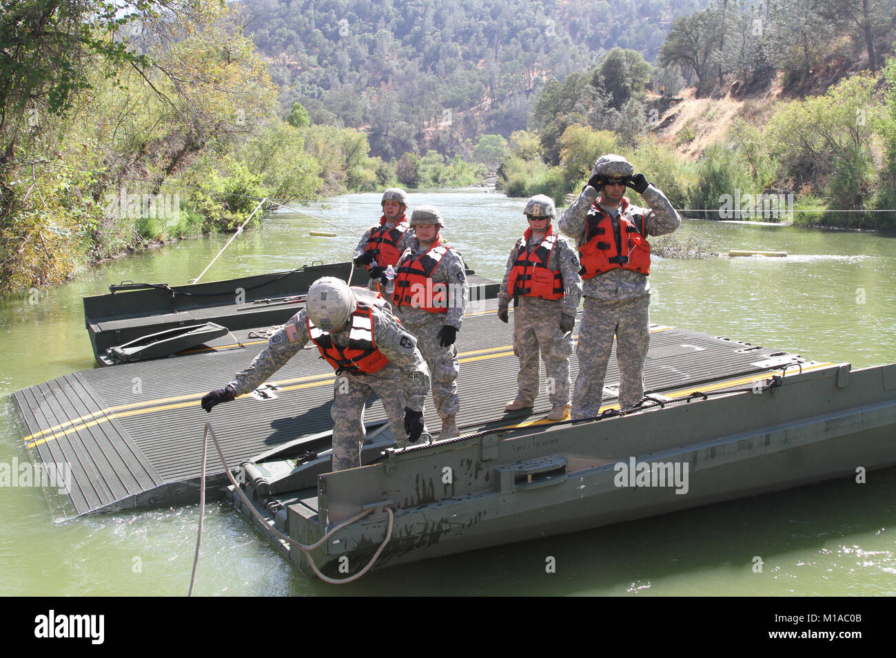 Members of the 132nd Multirole Bridge Company (MRBC), California Army ...