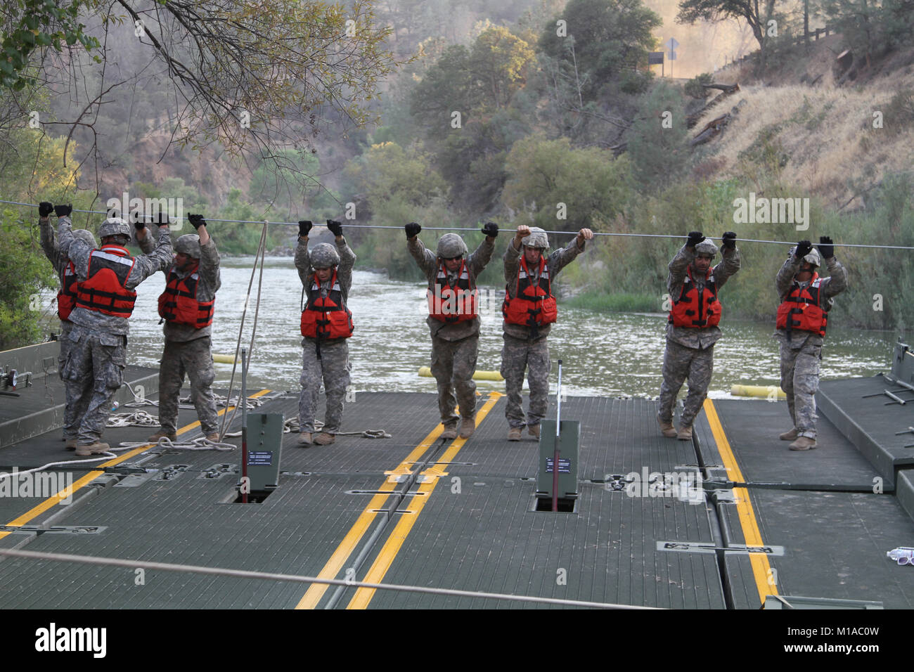 A launch and retrieve team from the 132nd Multirole Bridge Company ...