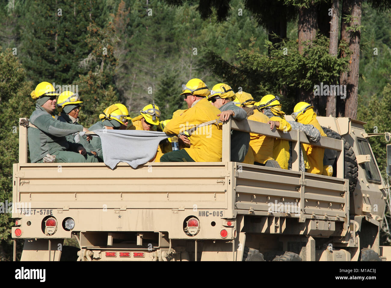 A hand crew from Task Force Alpha, California Army National Guard ...