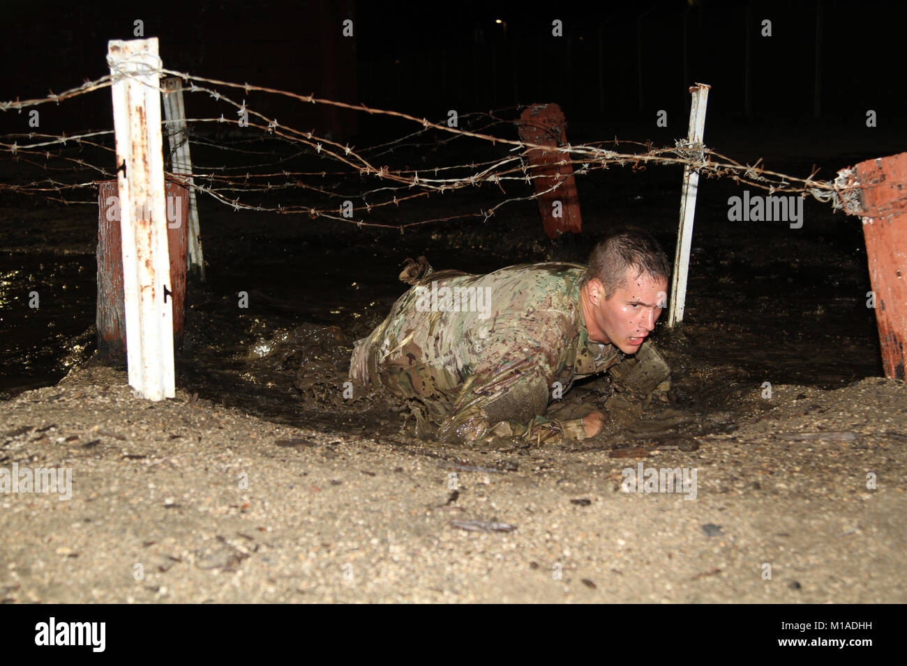 Sgt. John Rotner, 1st Battalion, 18th Cavalry Regiment, body crawls ...