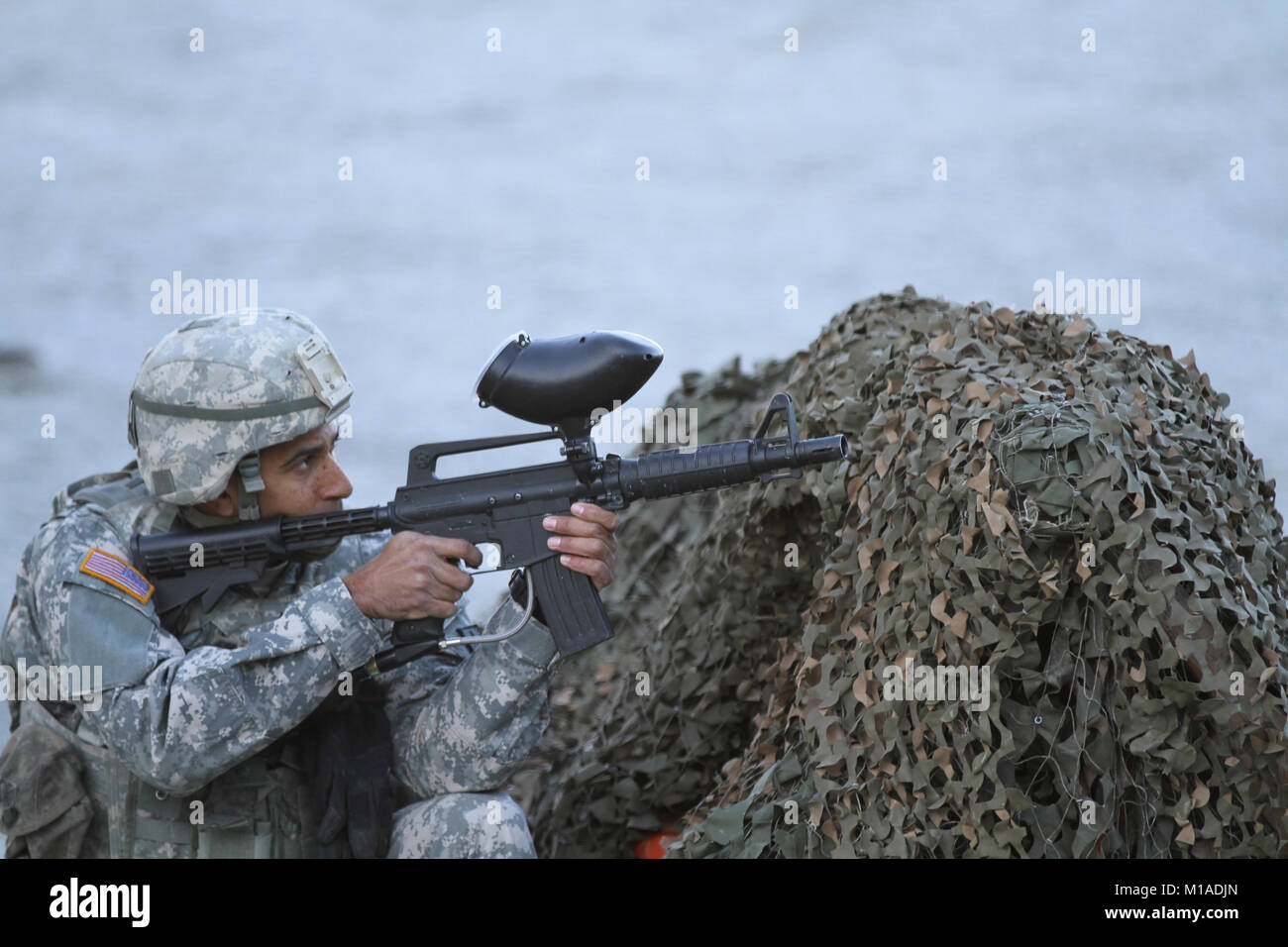 Sgt. Paul South, 1st Battalion, 144th Field Artillery, eyes a shooter ...