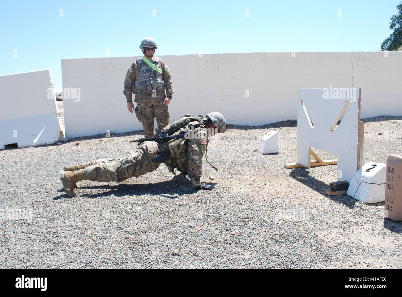 Pvt. Carlo Octoman, from the 330th MP Company, does pushups on the ...