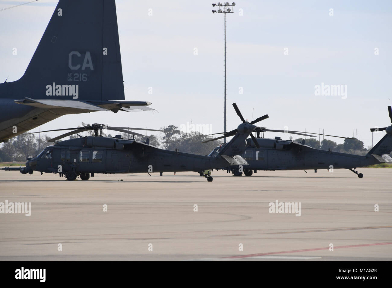 U.S. Air National Guard members from the 146th Airlift Wing and two ...