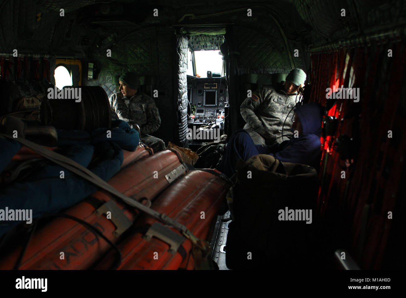 CH-47F Chinook flight engineers Sgt. First Class Jon Schon (left) and ...