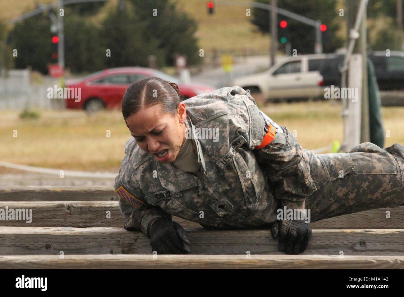 Guam Army National Guardsman Spc. Nicole D. Cruz maneuvers through the ...