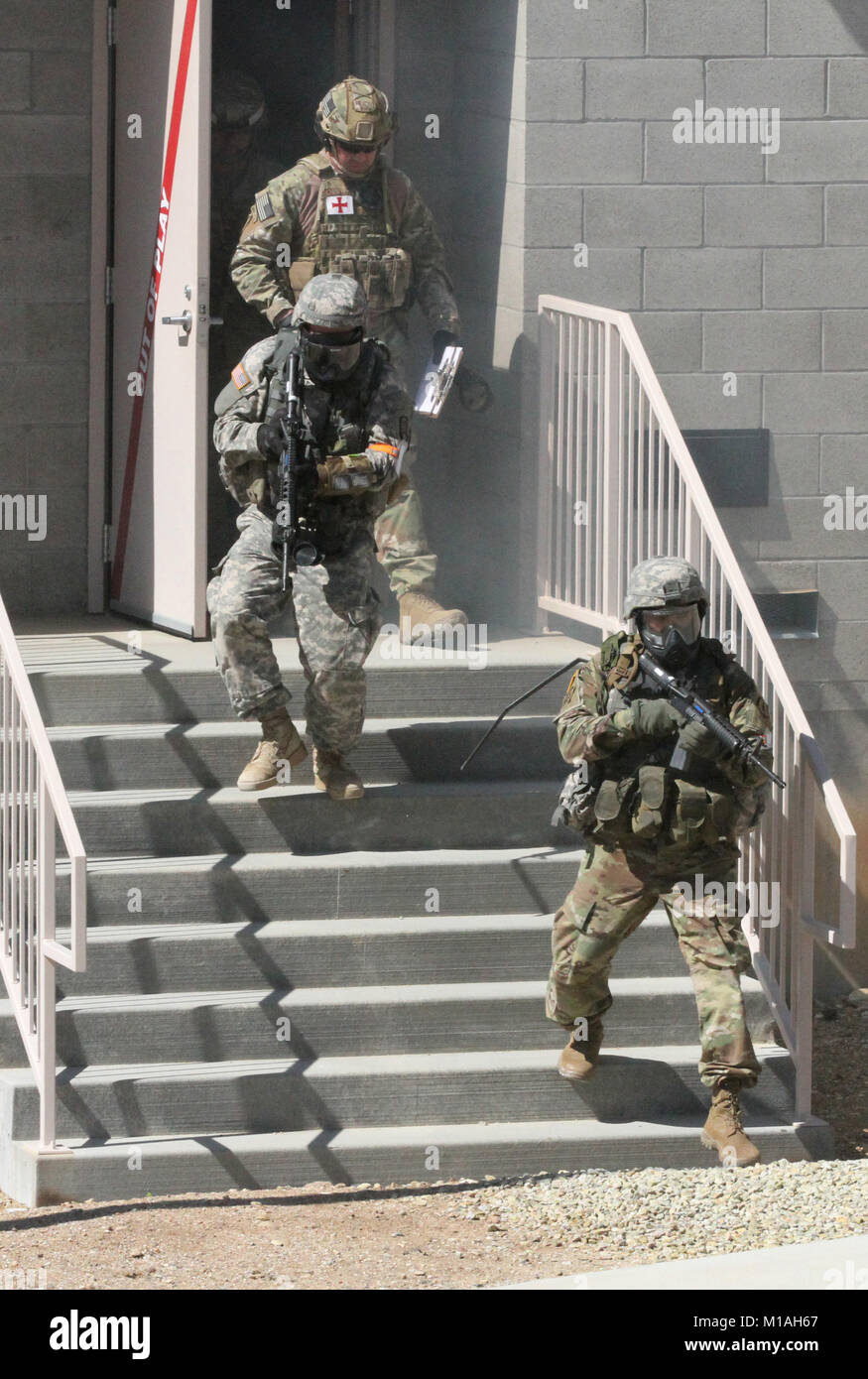 The New Mexico Army National Guard tandem of Pfc. Jacob Dunlap, left ...