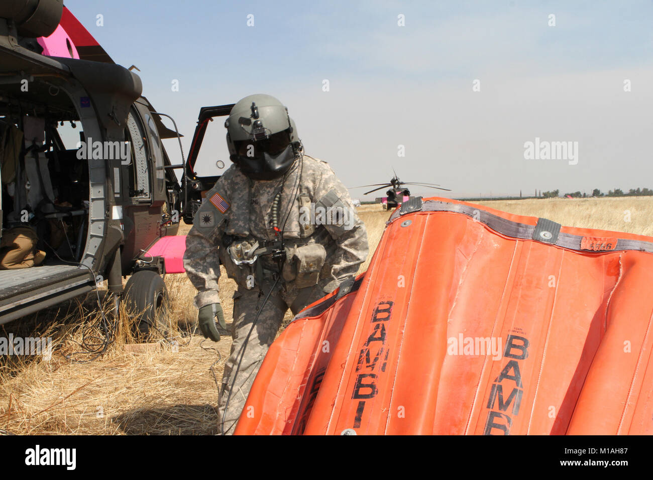 Staff Sgt. Ge Xiong, crew chief aboard a UH-60 Black Hawk from the ...