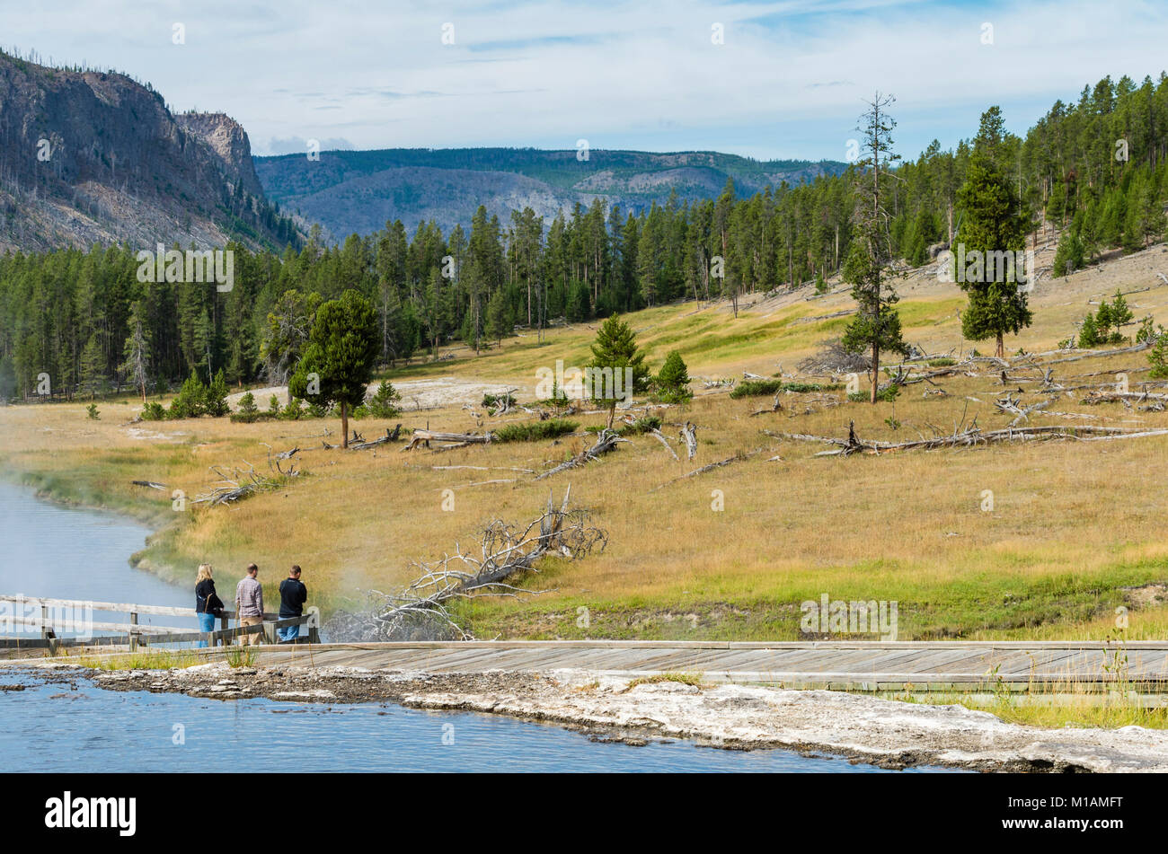 Tourists visiting the Terrace Springs thermal feature. Yellowstone ...