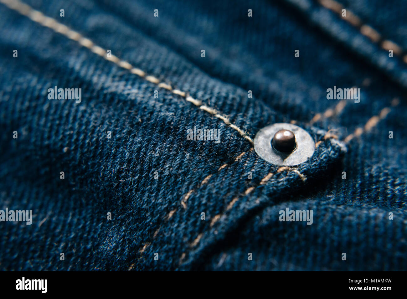 Jeans rivet on blue denim jeans with copy space. fashion concept Stock ...