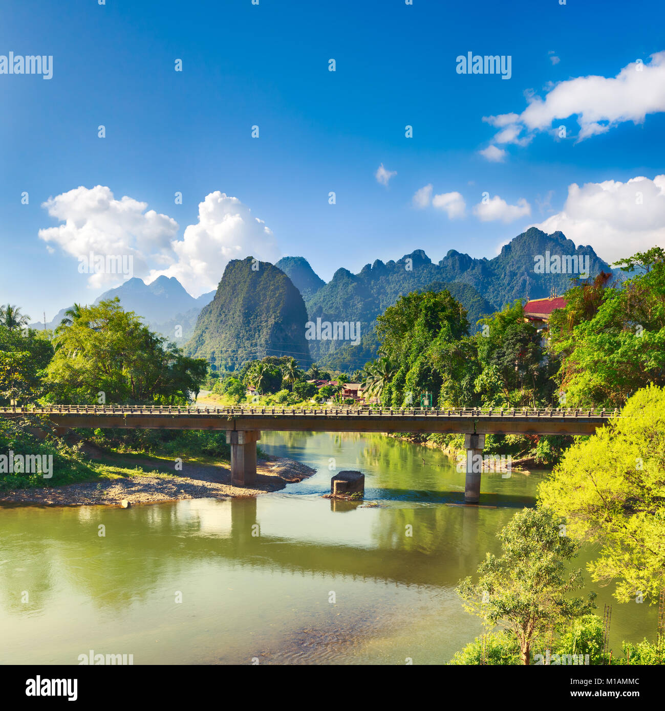 Amazing landscape of Nam Song river among mountains. Bridge on the ...