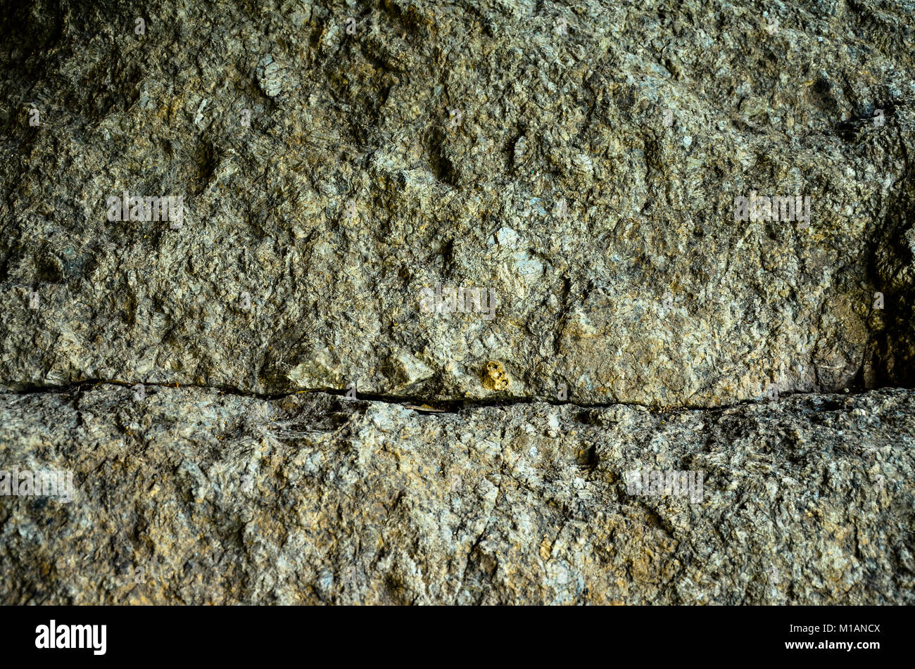 Photo of close up of rough and cracked rock surface Stock Photo - Alamy