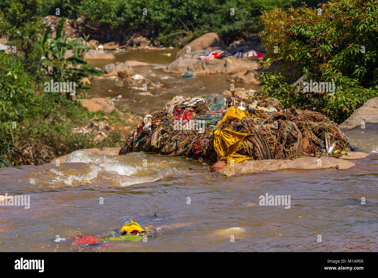 Water rubbish pollution with plastic and other floating stuffs in the ...